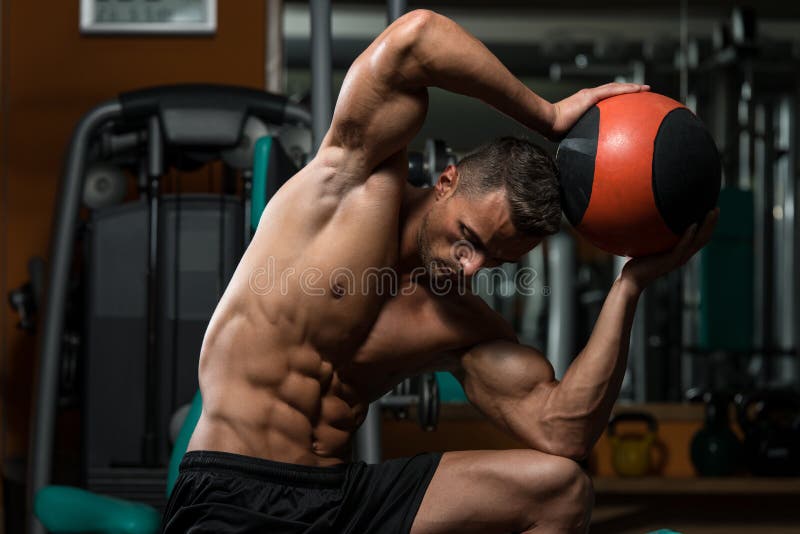 Muscular Man Exercise with Medical Ball Stock Image - Image of build ...