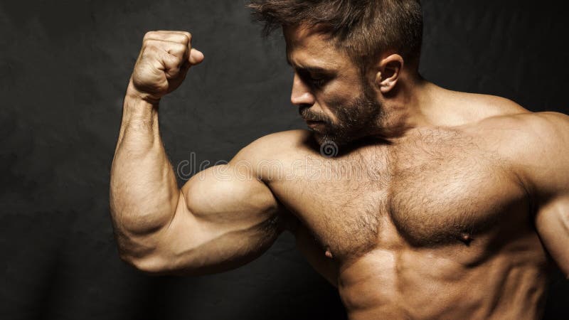 A Muscular Man Flexing His Biceps Stock Image - Image of work, biceps ...