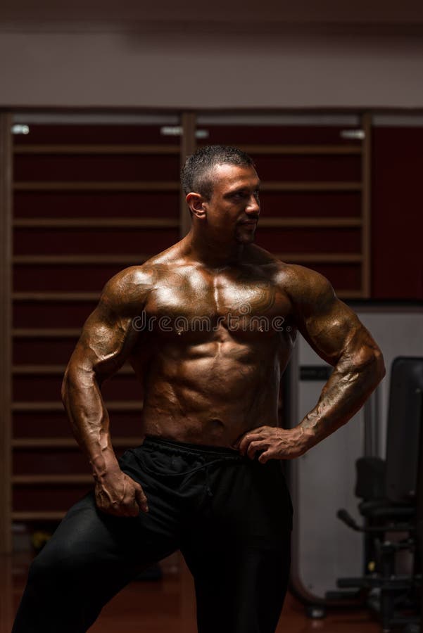 Muscular Man Flexing Muscles Stock Image - Image of muscles, muscular ...