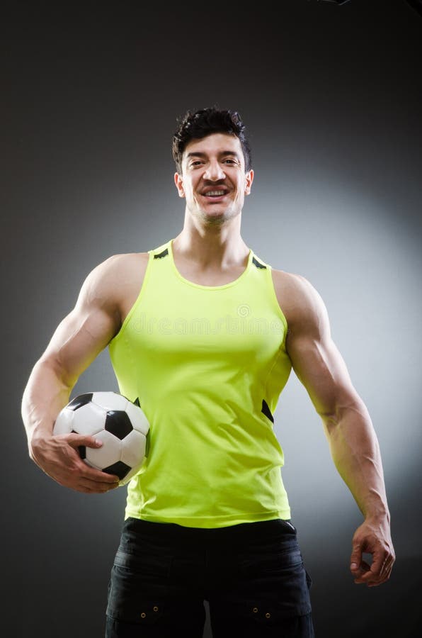 The Muscular Man with Football Ball Stock Image - Image of person, ball ...