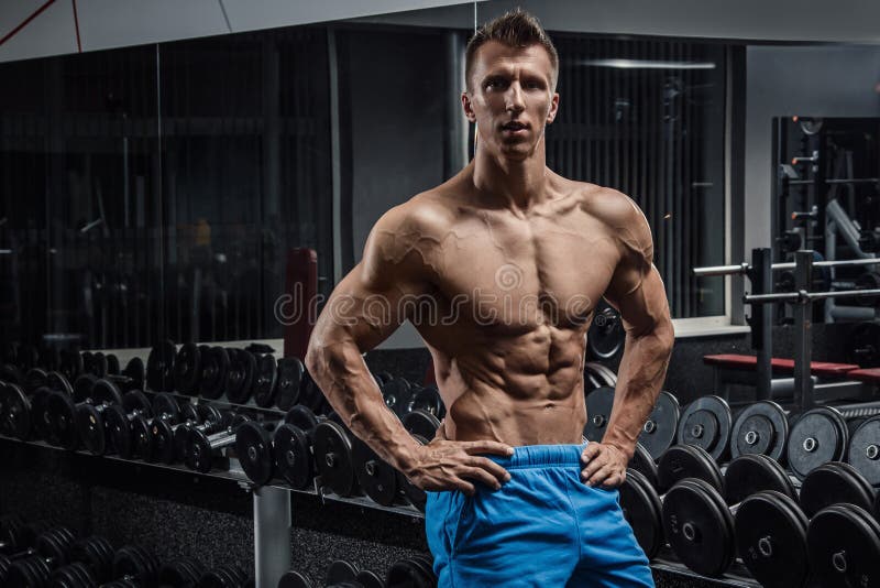 Muscular Man during Workout in the Gym Stock Photo - Image of biceps ...