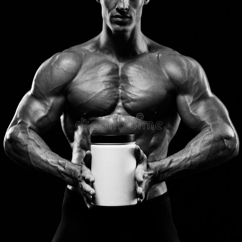 Muscular Man Holding Jar with Protein Stock Photo - Image of background ...