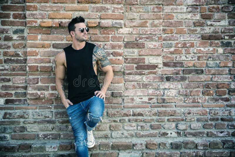 1,207 Bodybuilder Brick Wall Stock Photos - Free & Royalty-Free Stock ...