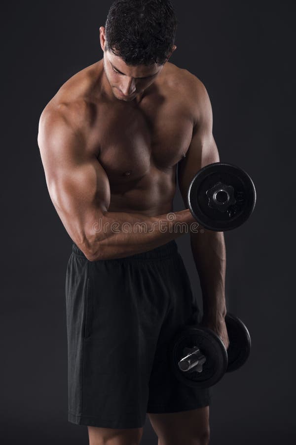 Muscular Man Lifting Weights Stock Photo - Image of caucasian, content ...