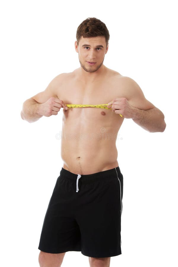 Muscular Man Measuring His Chest. Stock Photo - Image of slim ...