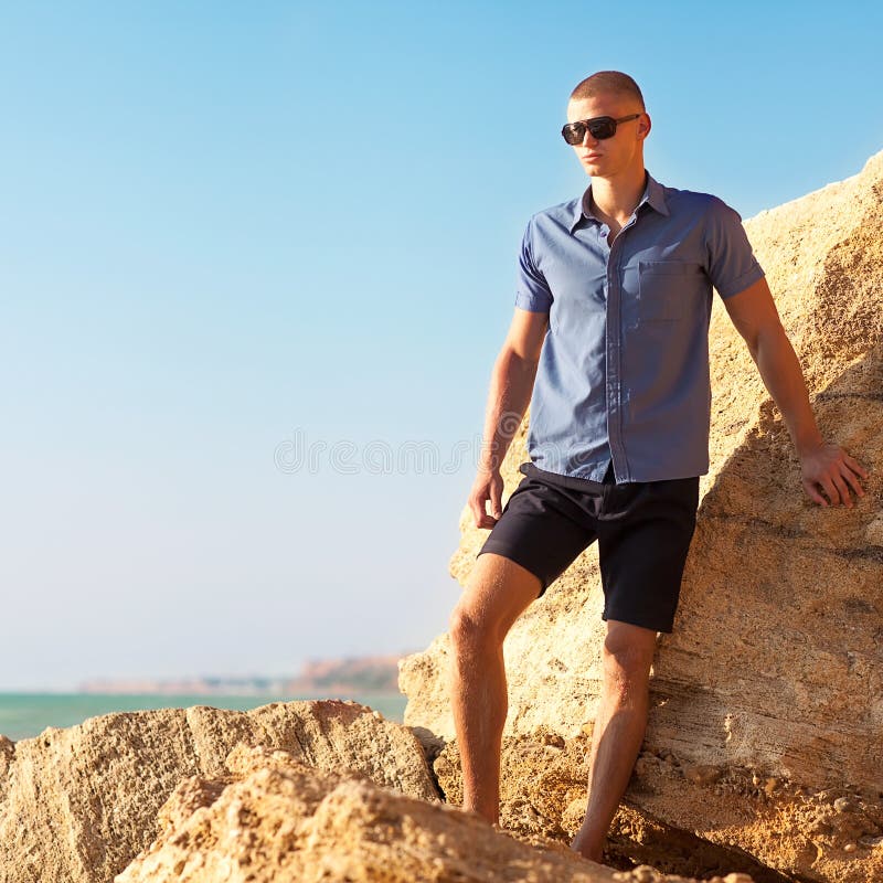 Muscular man and ocean stock photo. Image of goodlooking - 35861096