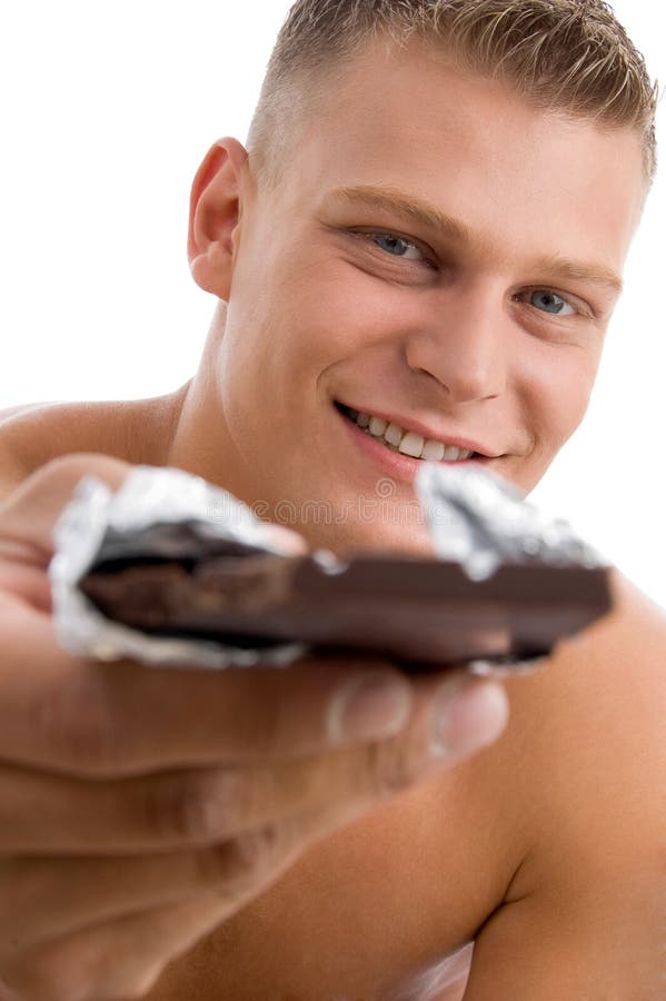Young Fit Man Holding Dark Chocolate Pieces Stock Photo - Image of body ...