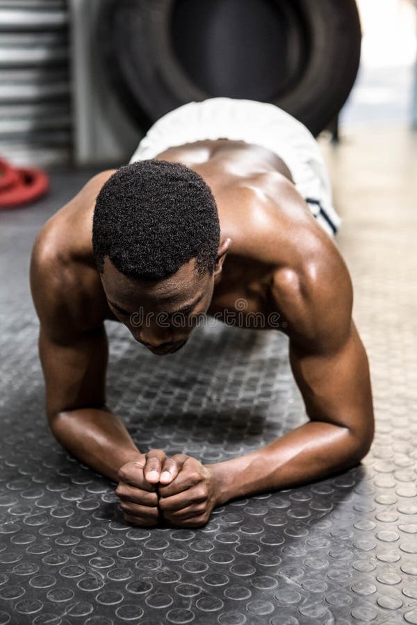 Muscular man planking stock image. Image of club, lifestyle - 66930509