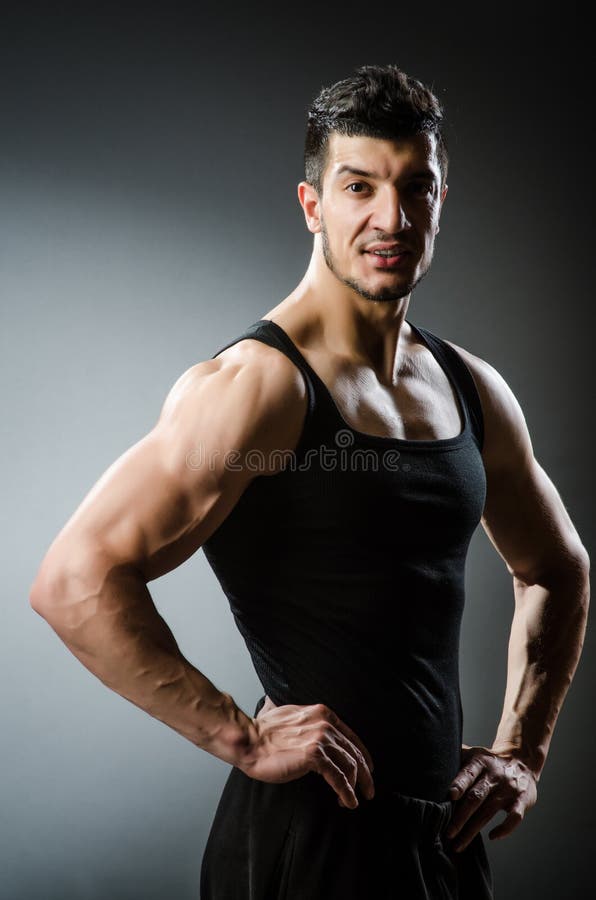 Muscular man posing stock image. Image of biceps, powerful - 44314137
