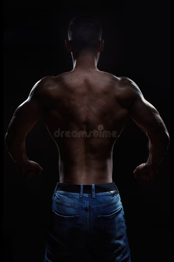 Developed Big Muscle Man Posing His Back in Studio Stock Image - Image ...