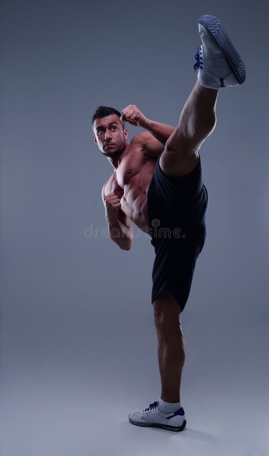 Man practicing body combat stock image. Image of jumping - 50552773