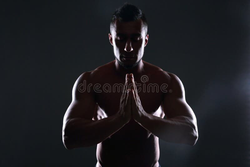 Muscular man praying stock image. Image of nude, dark - 48032631