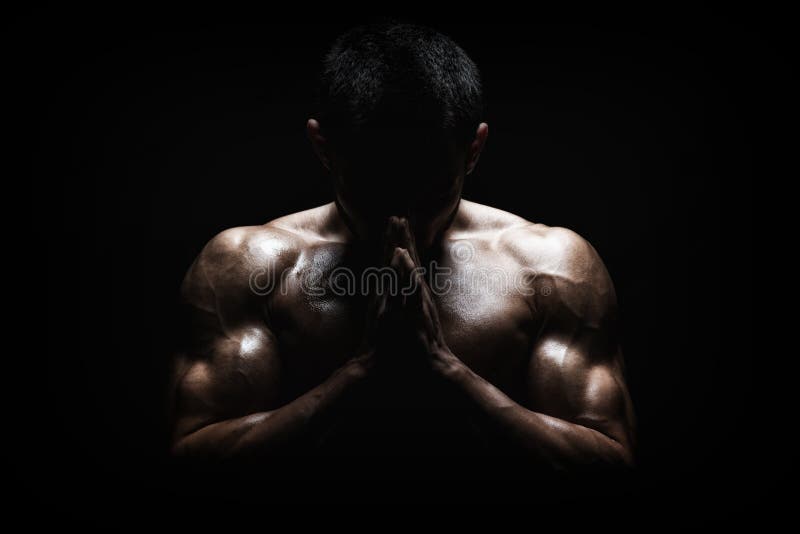 Muscular Man Praying stock photo. Image of build, male - 40320122