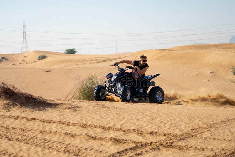 Muscular Man Riding Atv in the Desert Stock Photo - Image of speed ...