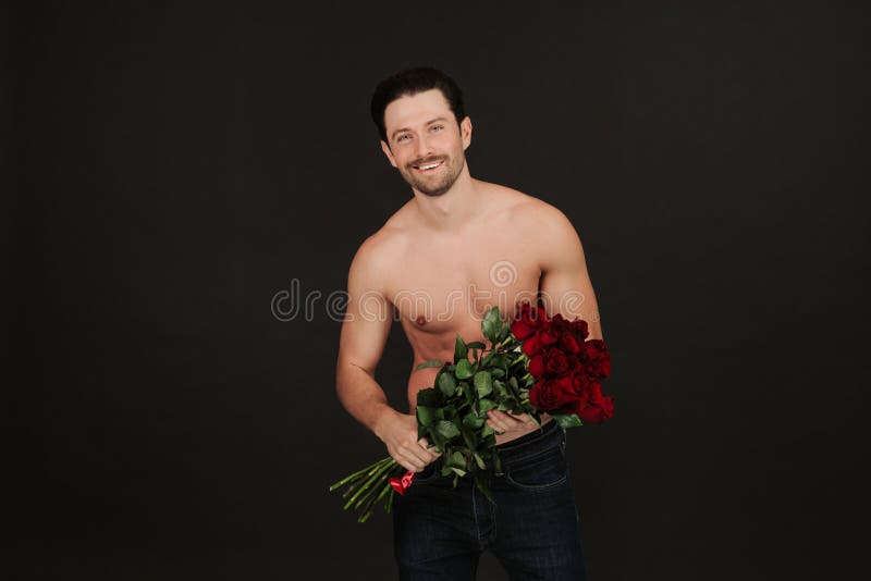 Muscular Man with Roses - Studio Shot Stock Photo - Image of body ...