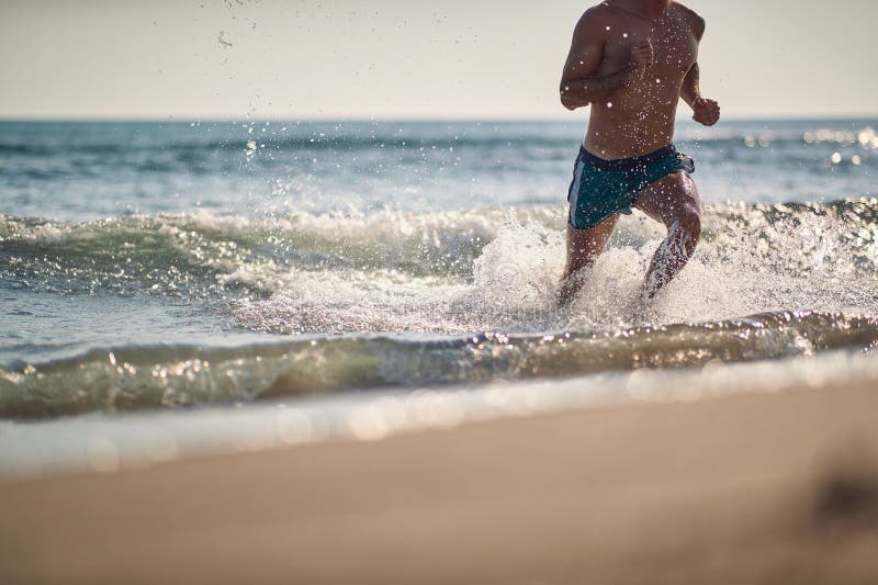 Muscular Man Run in Water, Drop of Water Shining Stock Photo - Image of ...