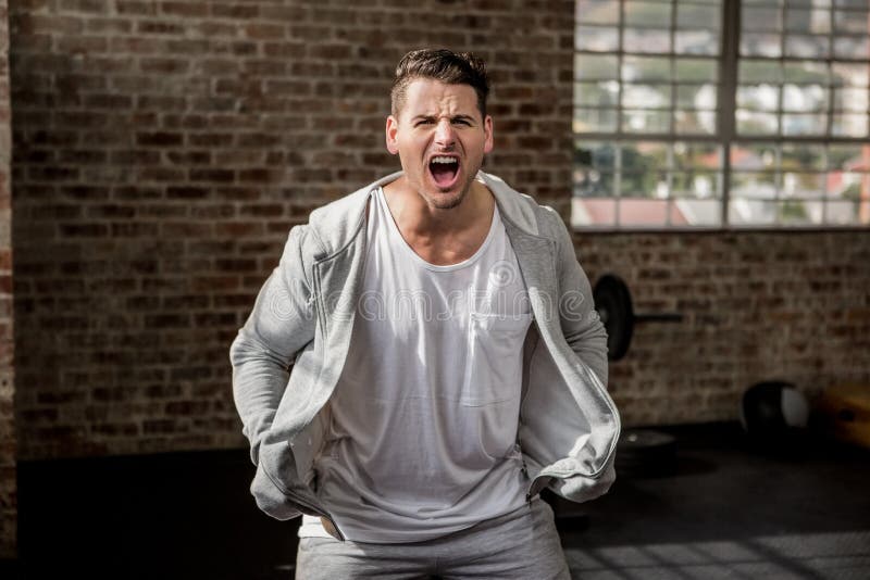 Muscular man screaming stock photo. Image of bodybuilding - 60551464