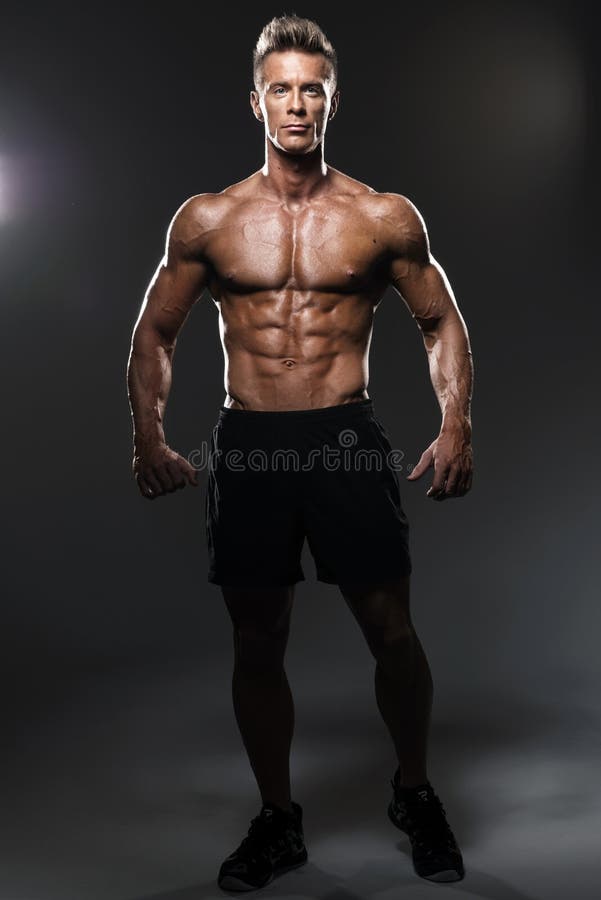 Muscular man in shadow stock photo. Image of body, naked - 61217474