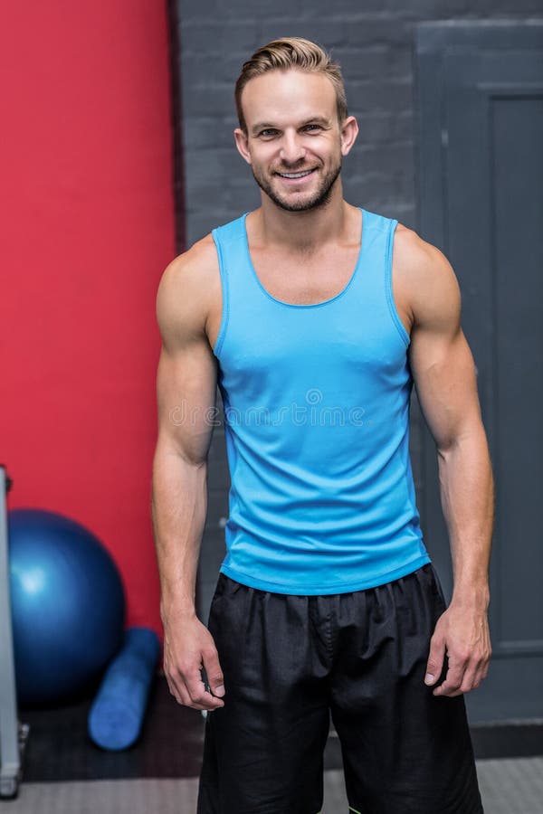 Muscular Man Smiling at Camera Stock Image - Image of body, focused ...