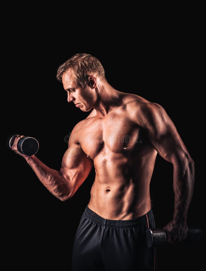 Muscular Man Working Out Doing Exercises with Dumbbells at Biceps Stock ...