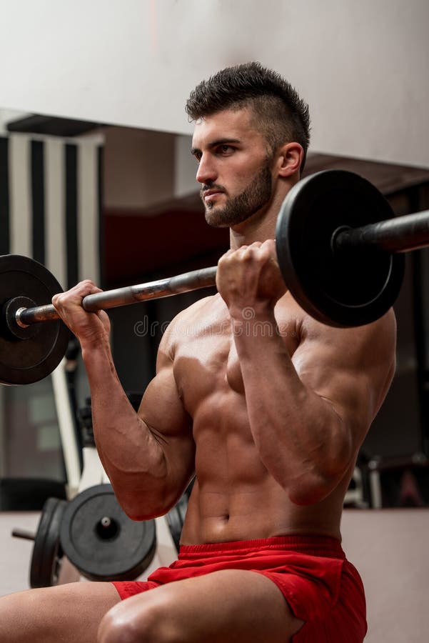 Muscular Men Doing Heavy Weight Exercise for Triceps Stock Image ...