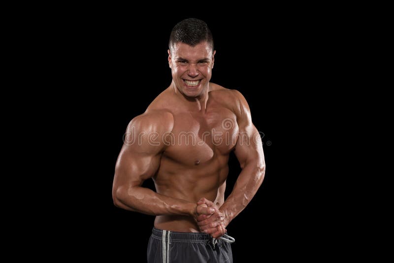 Muscular Men Flexing Muscles on Black Background Stock Photo - Image of ...