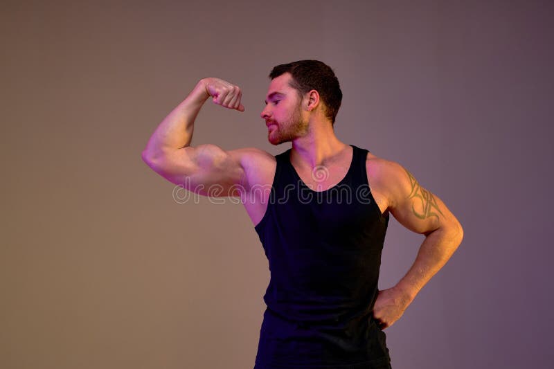 Muscular Motivated Ambitious Young Man Shows His Strength Stock Image ...