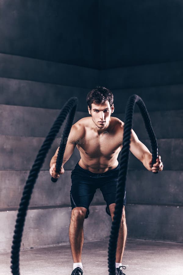 Muscular Powerful Man Training with Rope Stock Image - Image of ...
