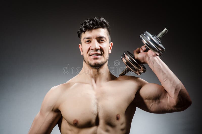 Muscular Ripped Bodybuilder with Dumbbells Stock Image - Image of ...