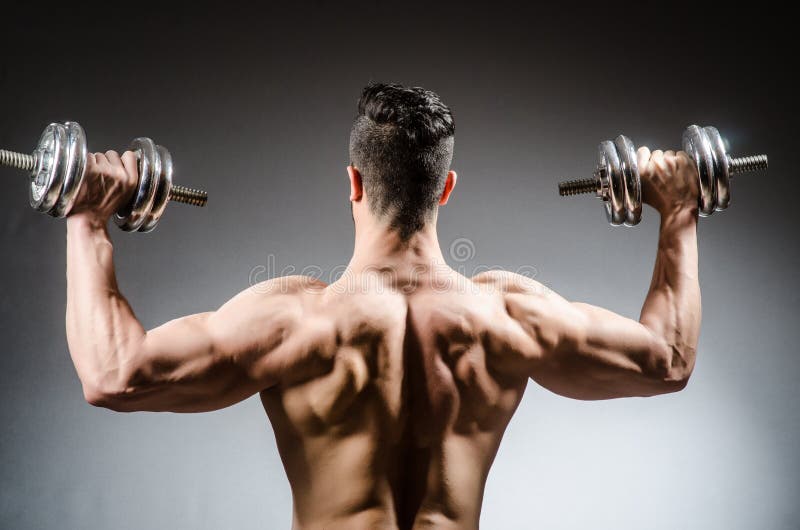 Muscular Ripped Bodybuilder with Dumbbells Stock Image - Image of ...