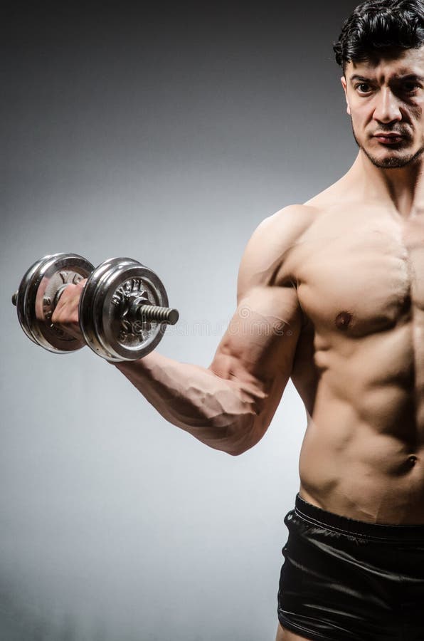 Muscular Ripped Bodybuilder with Dumbbells Stock Image - Image of ...