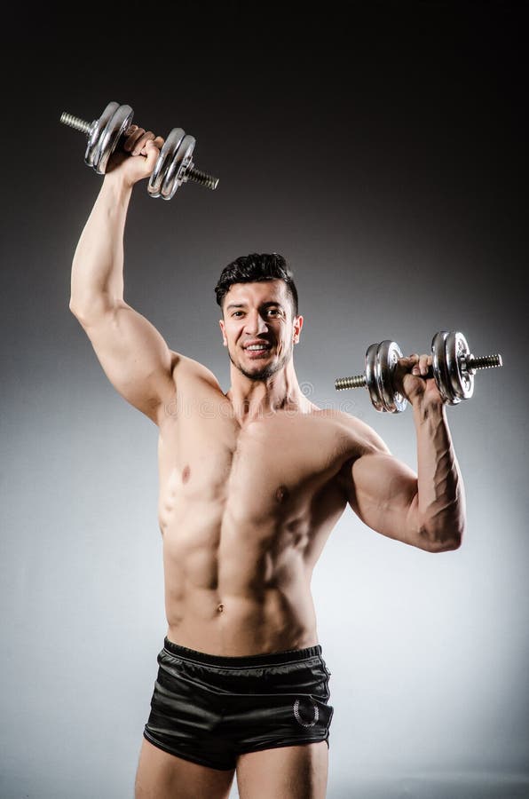 Muscular Ripped Bodybuilder Stock Photo - Image of fitness, dumbbells ...