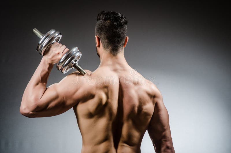 Muscular Ripped Bodybuilder with Dumbbells Stock Photo - Image of ...