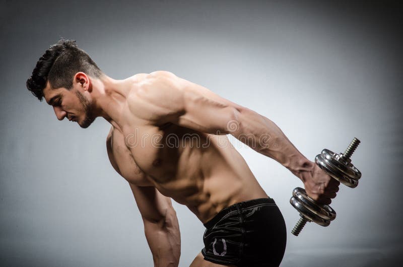 Muscular Ripped Bodybuilder with Dumbbells Stock Image - Image of ...