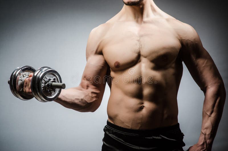Muscular Ripped Bodybuilder with Dumbbells Stock Image - Image of ...
