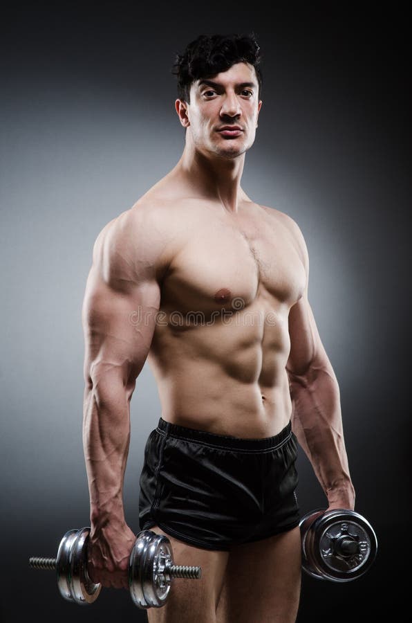 Muscular Ripped Bodybuilder with Dumbbells Stock Photo - Image of bicep ...