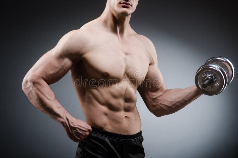 Muscular Ripped Bodybuilder with Dumbbells Stock Photo - Image of ...
