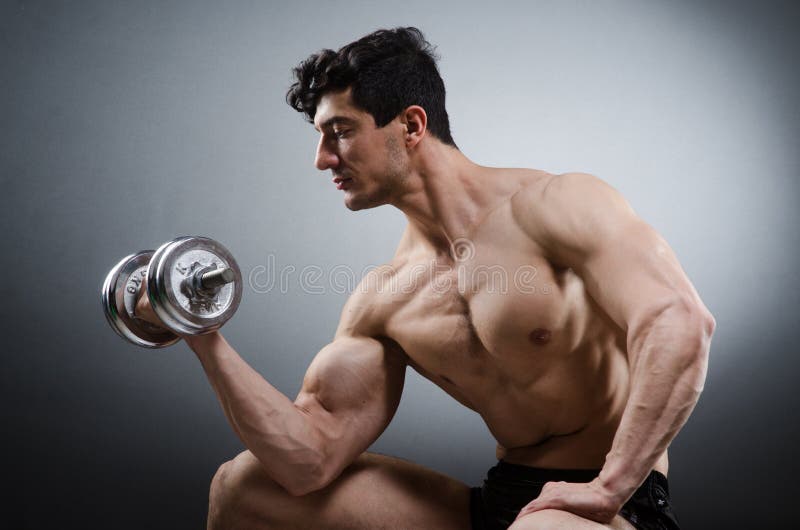 Muscular Ripped Bodybuilder with Dumbbells Stock Image - Image of ...
