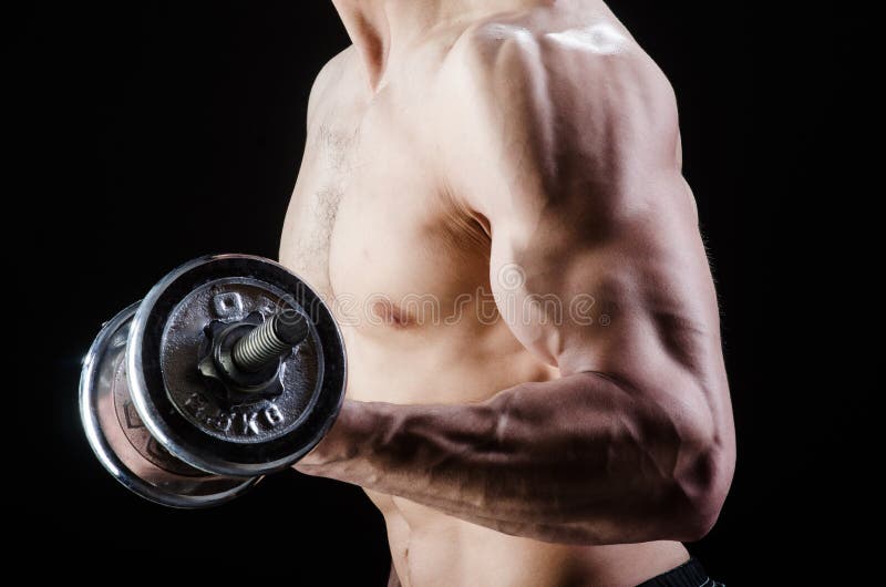 Muscular Ripped Bodybuilder with Dumbbells Stock Photo - Image of ...