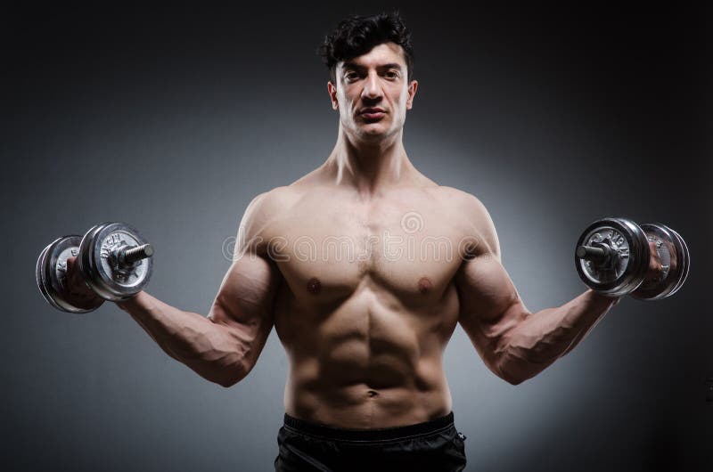 Muscular Ripped Bodybuilder with Dumbbells Stock Image - Image of ...