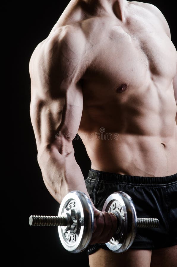 The Muscular Ripped Bodybuilder with Dumbbells Stock Image - Image of ...