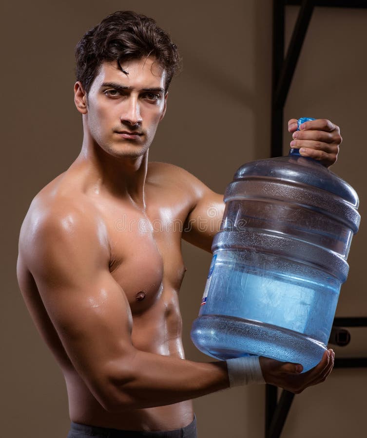 Muscular Ripped Bodybuilder with Dumbbells Stock Photo - Image of ...