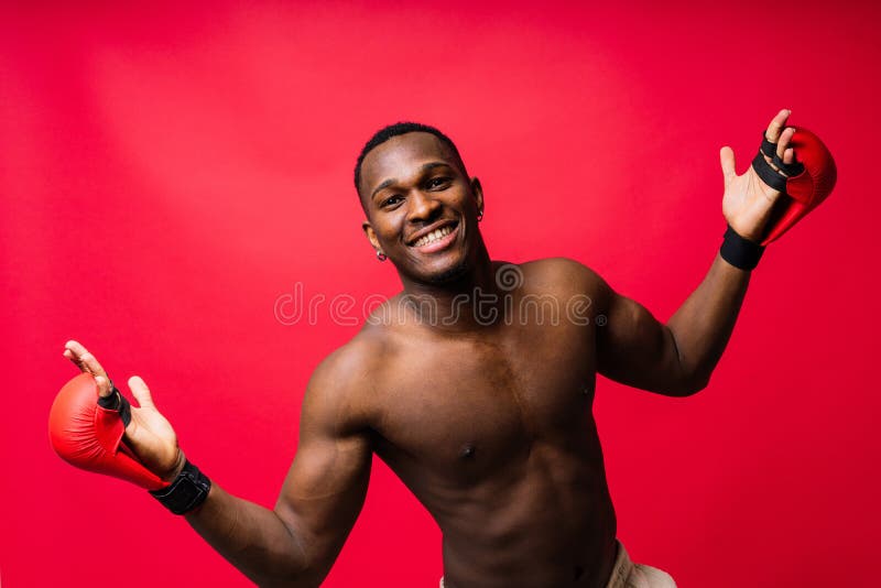 Muscular Serious Looking African Boxer Training, Studio Red Background ...