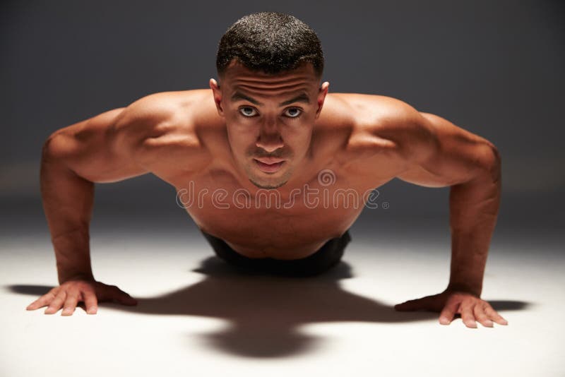 Muscular, Shirtless Young Man Doing Press-ups Stock Image - Image of ...