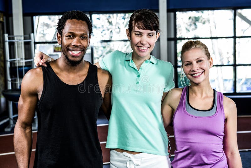 Smiling People Doing Power Fitness Exercise at Yoga Class Stock Photo ...