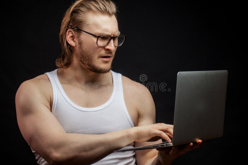 Muscular Athlet Learning To Work with Computer Stock Image - Image of ...