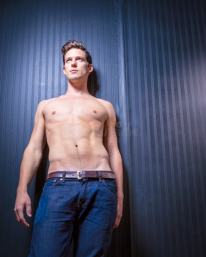 Slender Male Washboard Abs stock photo. Image of expression - 48179850