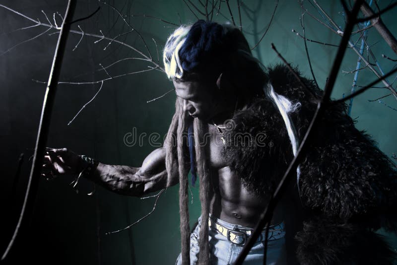 Muscular Werewolf with Dreadlocks with Long Nails among the Bran Stock ...