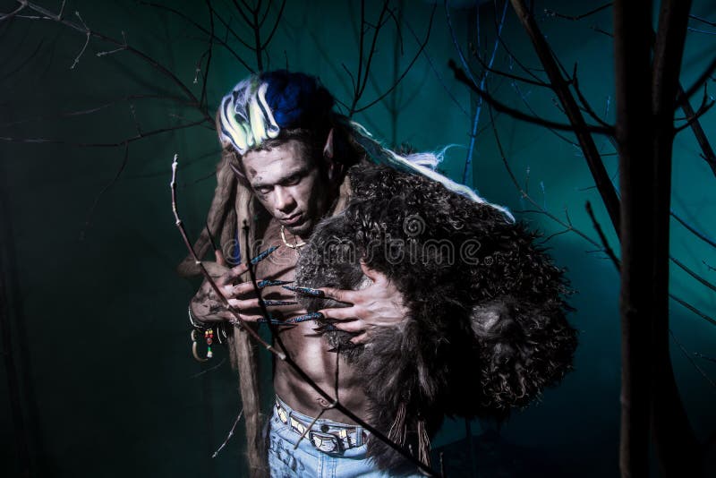 Muscular Werewolf with Dreadlocks with Long Nails among the Bran Stock ...