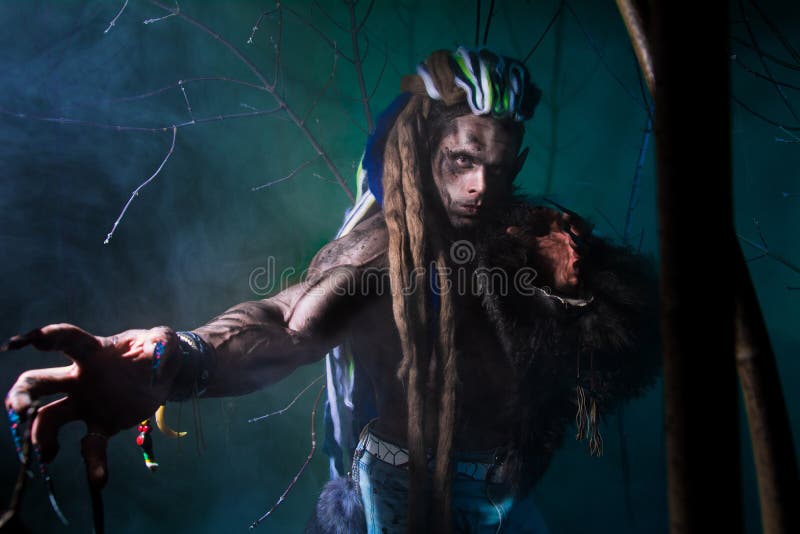 Muscular Werewolf with Dreadlocks with Long Nails among the Bran Stock ...